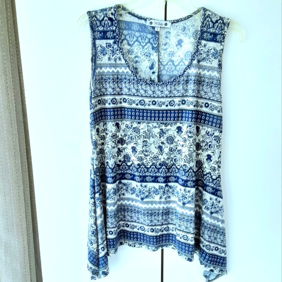 Wilde Bella | Tops | Wilde Bella Floral Sleeveless Tunic Top | Poshmark